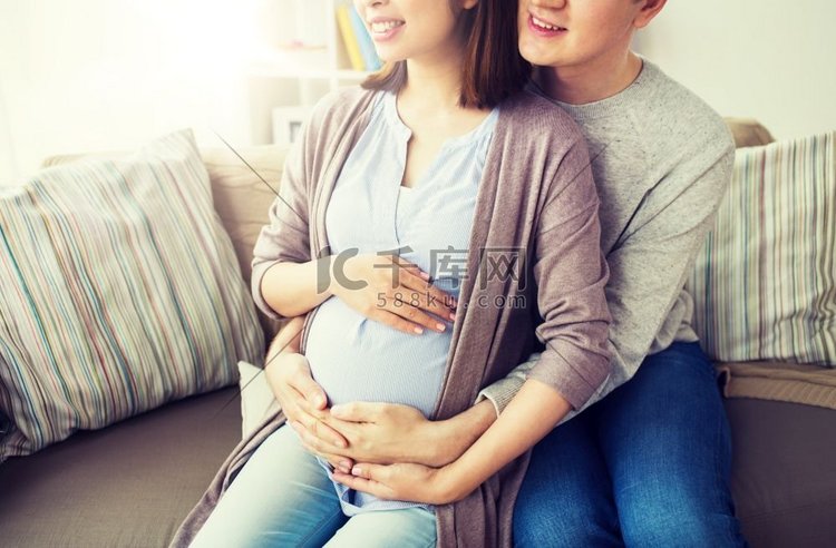 怀孕、家庭和人的概念-男人和孕妇的特写。高清摄影大图-千库网