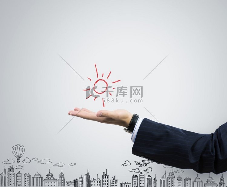 建设理念。商人手持建筑物草图的特写高清摄影大图-千库网