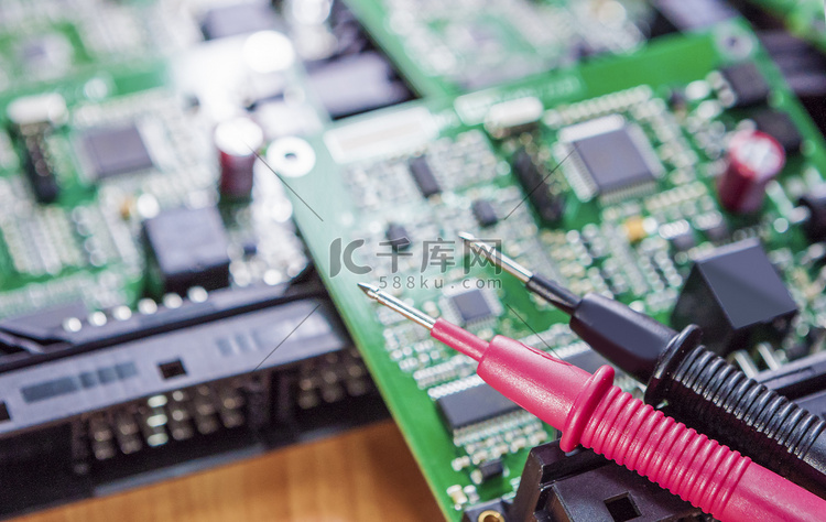 Laboratory Components and Staff. Pins of Digital Multimeter In Front of ...