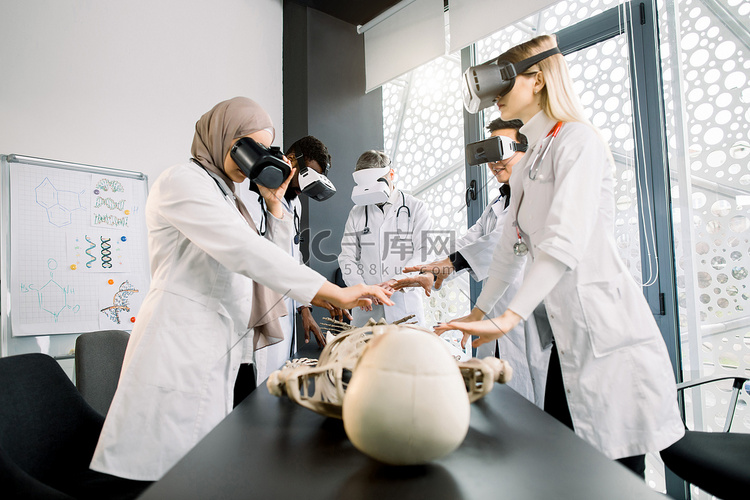 Human anatomy, VR, education, medicine concept. Young multiracial ...