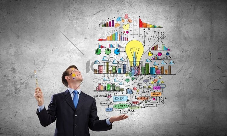 创造性思维。年轻英俊的商人手里拿着刷子高清摄影大图-千库网