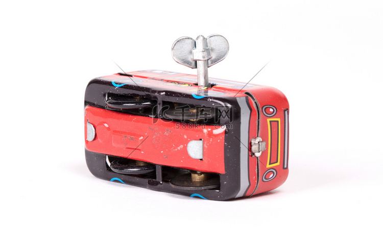 复古红色发条玩具车高清摄影大图-千库网