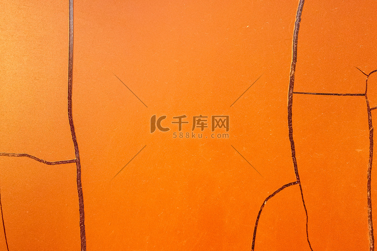 墙上破裂的橙色油漆。高清摄影大图-千库网