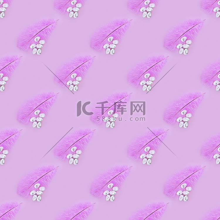 粉红色羽毛和鸡蛋在粉红色背景上的无缝纹理。高清摄影大图-千库网