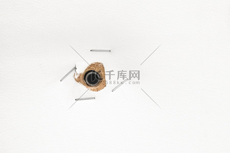 圆破旧料背景破损的白墙面孔圆高清摄影大图-千库网