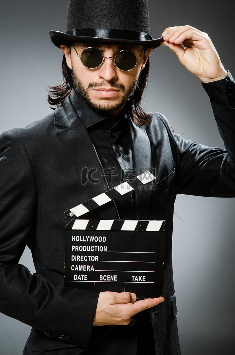 男人戴黑礼帽的复古概念高清摄影大图-千库网