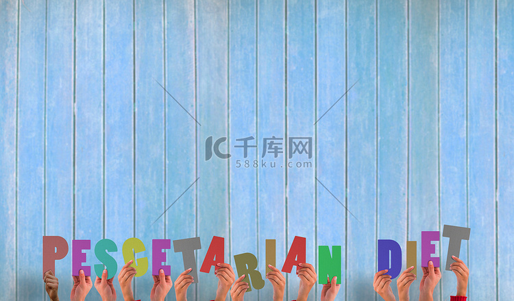 双手举起杀死 pescetarian 的复合图像高清摄影大图-千库网