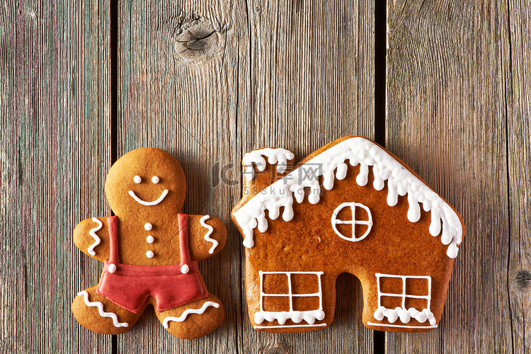 圣诞姜饼人和房子饼干高清摄影大图-千库网