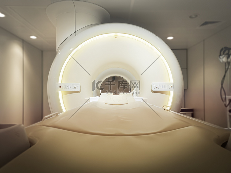医院的 MRI 扫描仪或磁共振成像扫描仪机器在模糊的 MRI 室背景下被隔离。高清摄影大图-千库网
