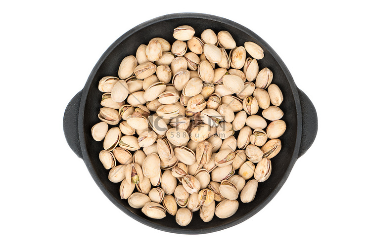 开心果放入煎锅中高清摄影大图-千库网