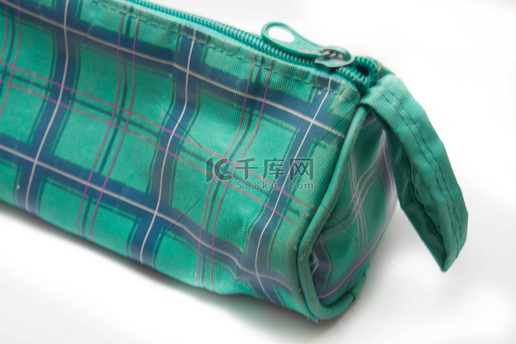 绿色铅笔袋高清摄影大图-千库网