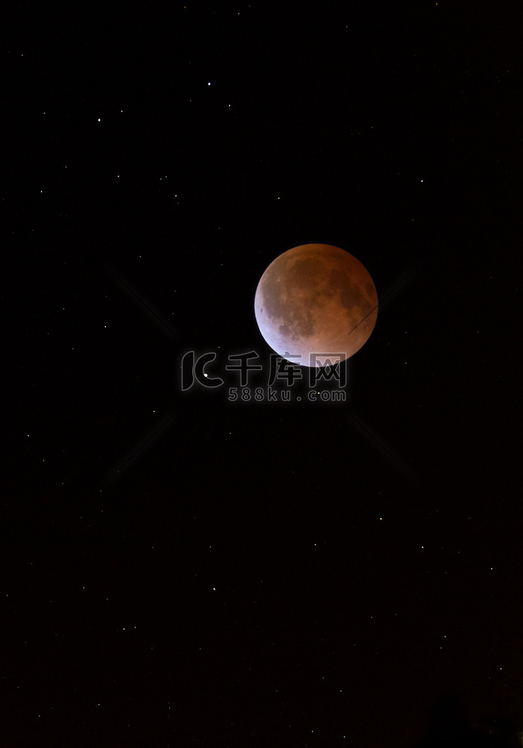 This is a photograph of the Lunar Eclipse Blood Moon moving out of its ...
