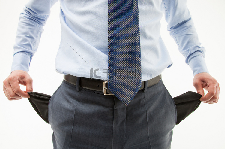 Businessman demonstrating his pockets高清摄影大图-千库网