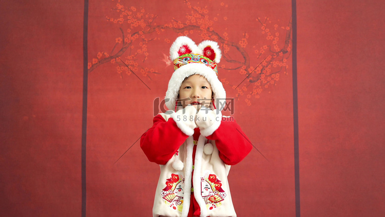 萌娃新年春节拜年实拍高清摄影大图-千库网
