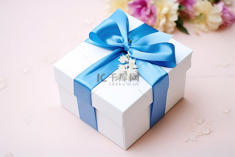 带有蓝丝带的礼品盒背景图片免费下载_海报banner/高清大图_千库网(图片编号7008125)