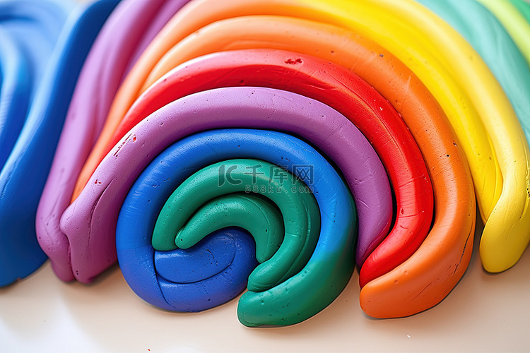 一些彩色粘土塑造成彩虹漩涡背景图片免费下载_海报banner/高清大图_千库网(图片编号7017298)