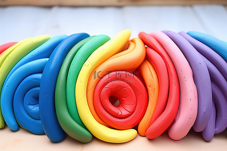 一些彩色粘土塑造成彩虹漩涡背景图片免费下载_海报banner/高清大图_千库网(图片编号7018119)