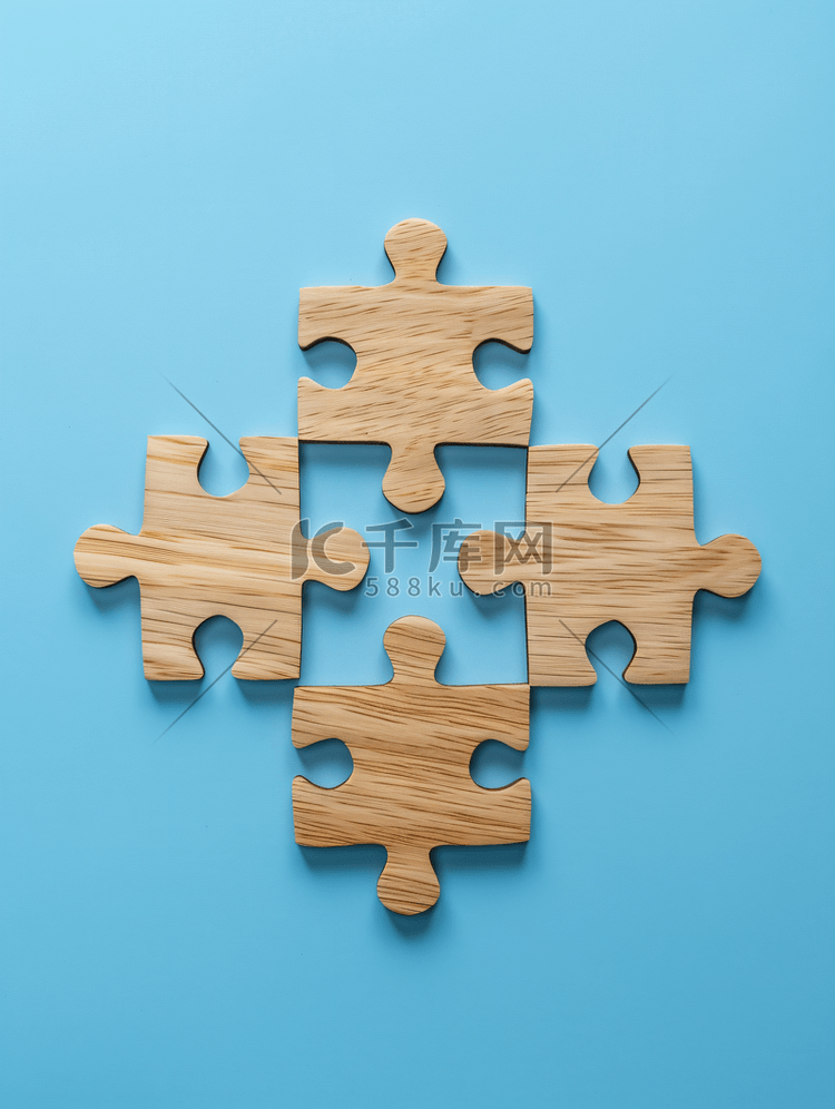 蓝色背景下完整的木制拼图业务合作高清摄影大图-千库网