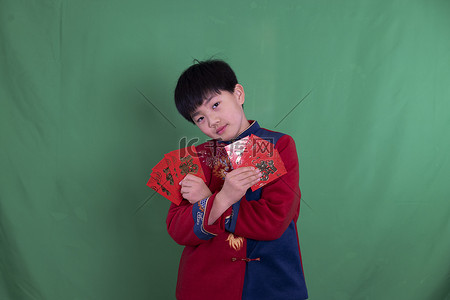 中国小男孩恭贺新年拜年红包绿幕抠像高清摄影大图-千库网