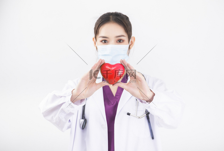 穿着白大褂的女医生高清摄影大图-千库网