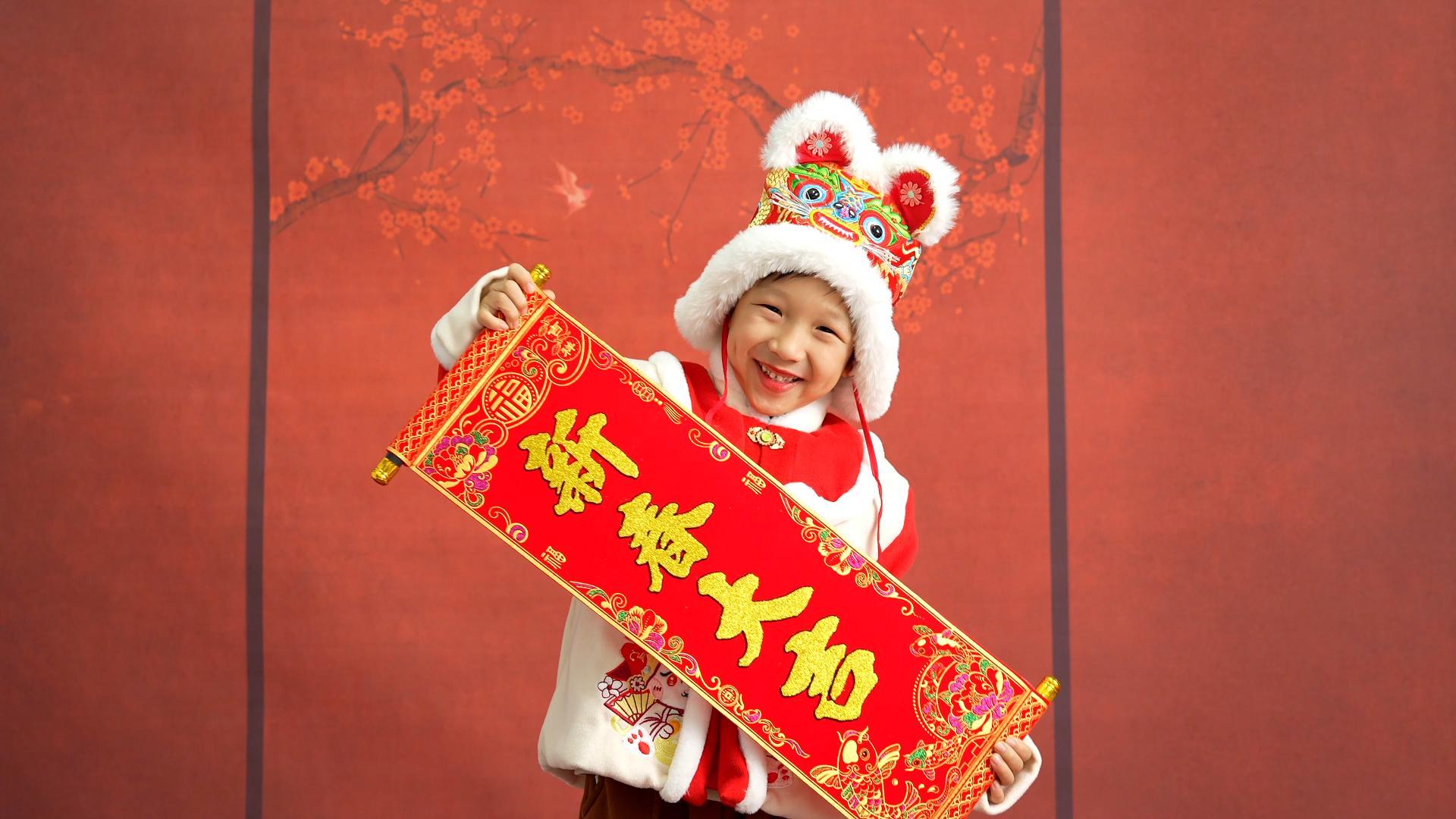 春节萌娃新年送祝福实拍4k实拍视频素材视频特效素材-千库网